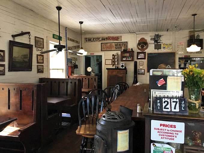 Every vintage sign and weathered wood panel tells a story. That potbelly stove isn't decoration&mdash;it's a cast iron historian keeping watch.