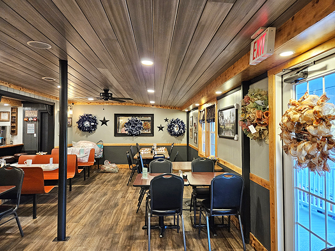 The dining room feels like Grandma's house got an upgrade&mdash;rustic wooden beams, country decor, and tables arranged for both privacy and community.