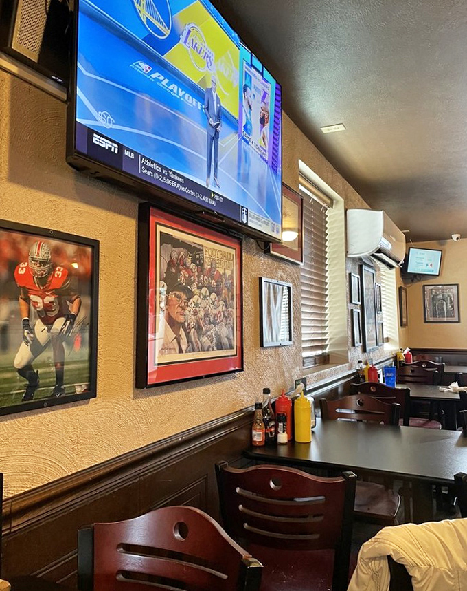 Sports memorabilia lines the walls like a timeline of Ohio pride, creating the perfect backdrop for comfort food conversations.
