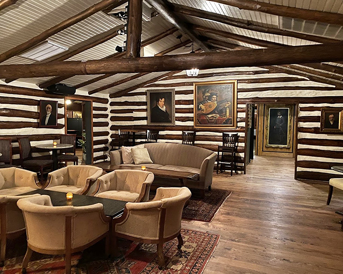 Not your average log cabin living room&mdash;unless your living room features museum-worthy portraits, exposed beams, and the promise of exceptional food.