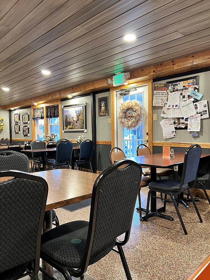 Empty tables waiting for their next story – the calm before the breakfast storm in a room where every wooden beam feels like home.