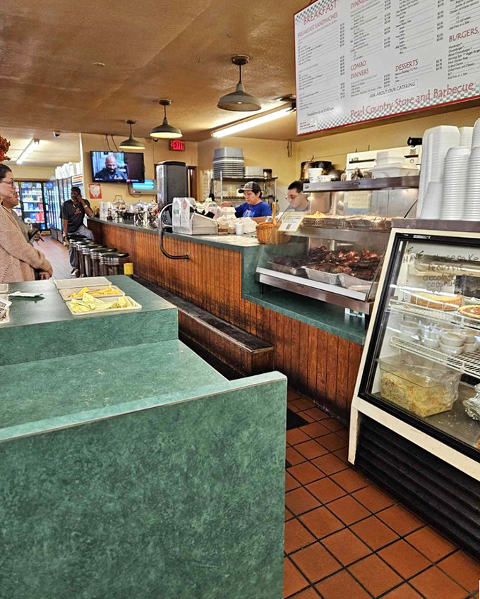 No-frills counter service with a side of Southern hospitality. The real VIPs here are the smoked meats waiting patiently behind that glass.