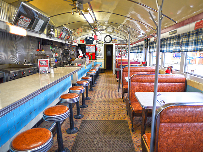 The curved ceiling and parallel lines of counter and booths create a perfect diner geometry&mdash;a time capsule where calories don't count and coffee refills are infinite.