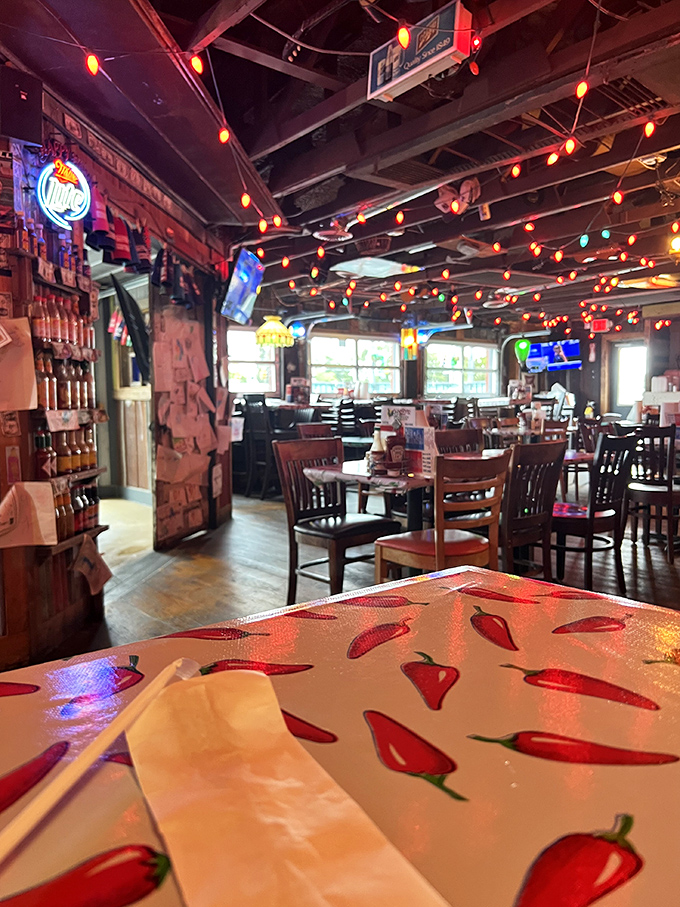The chili pepper tablecloth warns you what's coming. In this rustic space with string lights, delicious decisions are about to be made. 