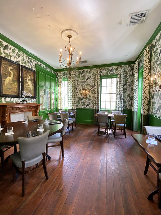 Another angle of the Green Room reveals why it's impossible to get a reservation&mdash;it's basically Southern hospitality wrapped in designer wallpaper.
