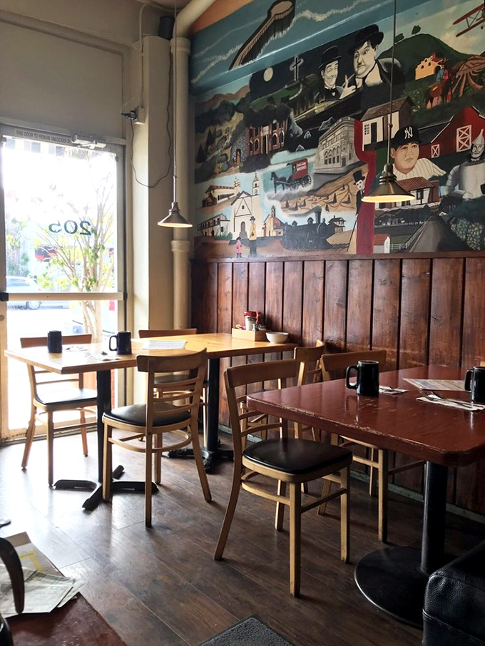 Step inside this time capsule where ceiling fans spin lazily and every booth tells stories of countless breakfast memories.