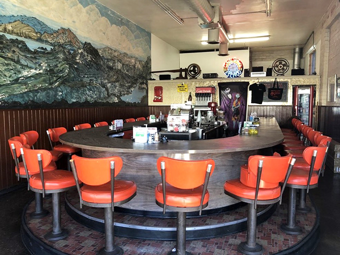 The curved counter isn't retro by design&mdash;it's retro by survival, with a stunning mountain mural that's witnessed decades of satisfied customers.