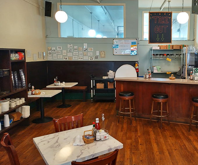 The take-out counter beckons with promises of breakfast to-go, though the marble-topped tables and wooden chairs make a compelling case for staying awhile.