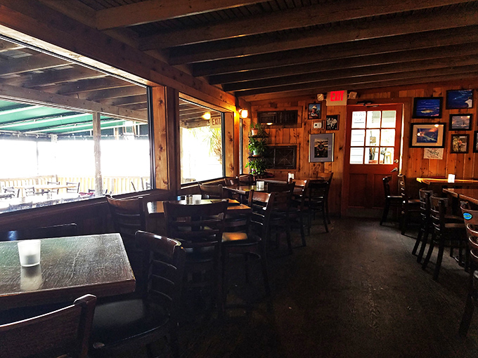The dining room feels like the world's coziest ship's cabin, where every wooden surface tells stories of countless memorable meals.
