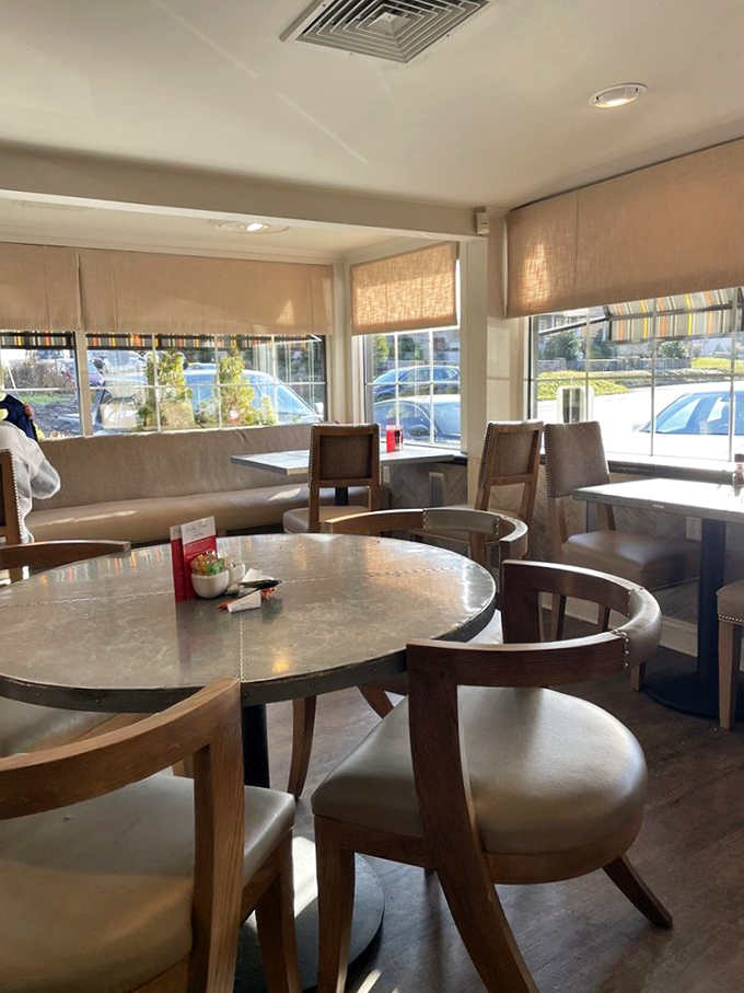 The dining room where strangers become friends over shared appreciation for perfectly prepared comfort food classics.