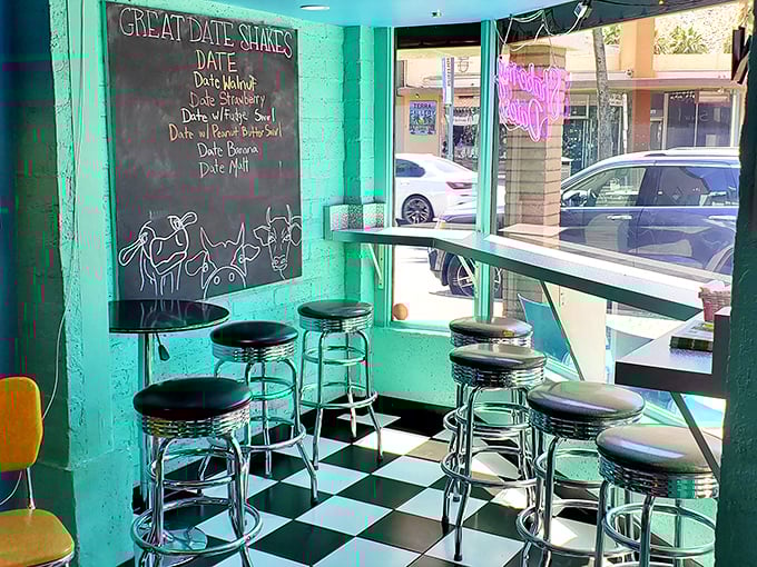 The checkered floor and mint walls create the perfect backdrop for your ice cream dreams to come true.
