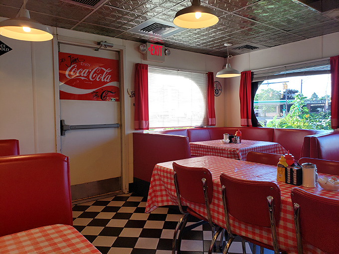 Red checkered tablecloths and Coca-Cola memorabilia&mdash;not because a designer said so, but because that's how it's always been. Authenticity you can feel.