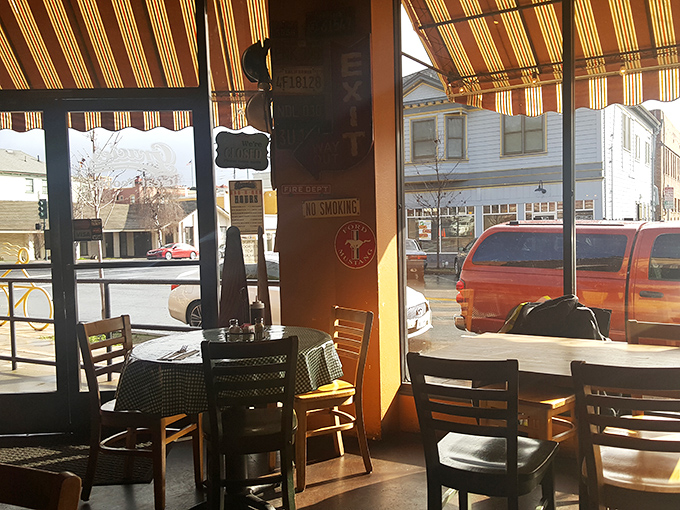 Sunlight streams through windows, warming the checkered tablecloths and wooden chairs. This isn't just dining&mdash;it's a California afternoon, bottled.