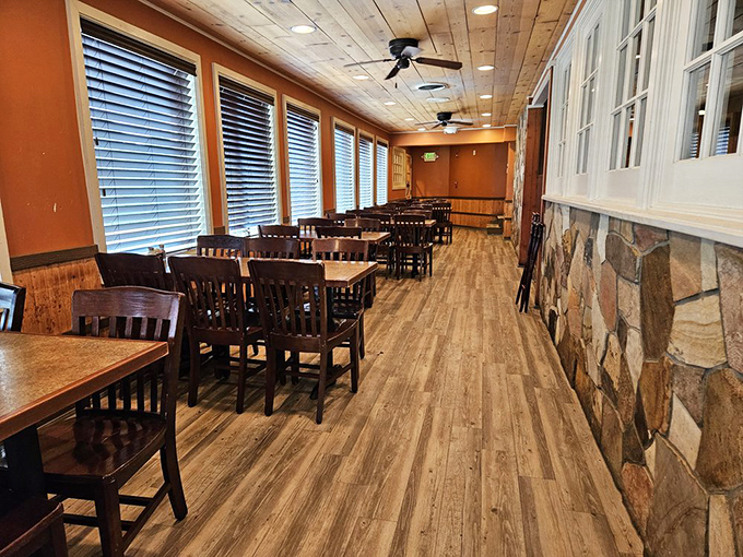 The dining room's warm wood tones and stone accents create that rare atmosphere where both first dates and family reunions feel equally at home.