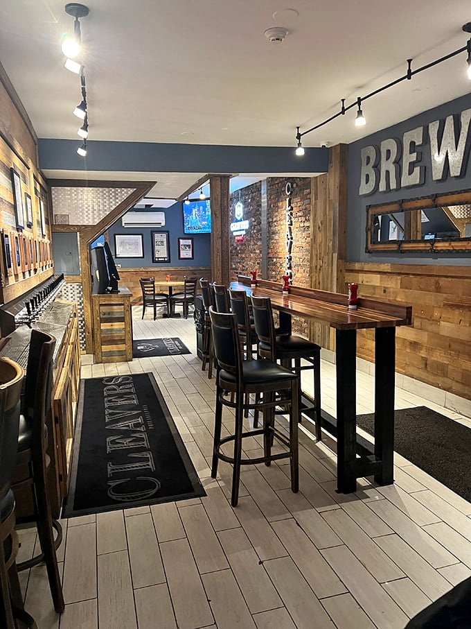 The "BREW" wall announces itself with rustic charm. This isn't just a place to eat; it's where sandwiches and craft beers find their perfect match.