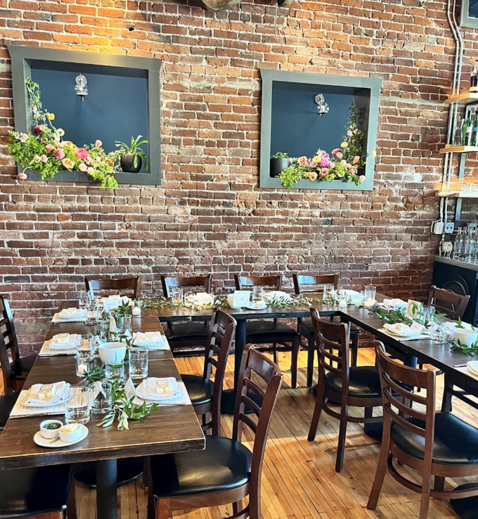 Exposed brick walls and thoughtfully arranged tables create the perfect backdrop for the food love stories about to unfold.