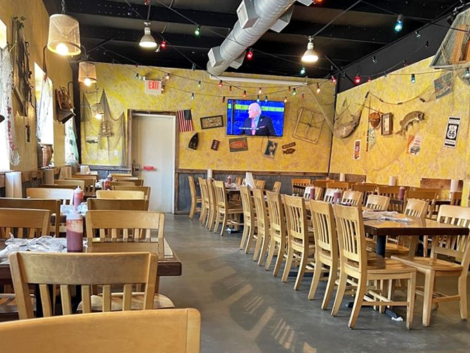 The dining room feels like someone turned an Ozark fishing cabin inside out, creating a space where stories flow as freely as the sweet tea.