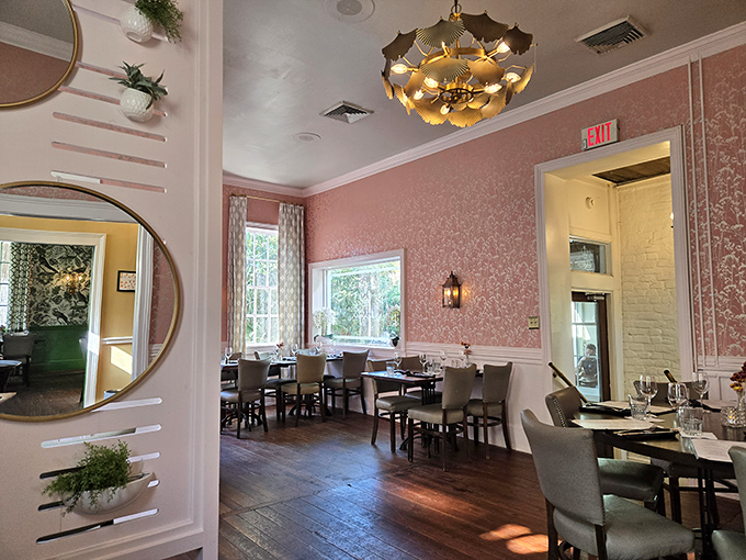 The pink dining room offers a different mood entirely&mdash;soft, elegant, and bathed in natural light that makes every dish look even more Instagram-worthy.