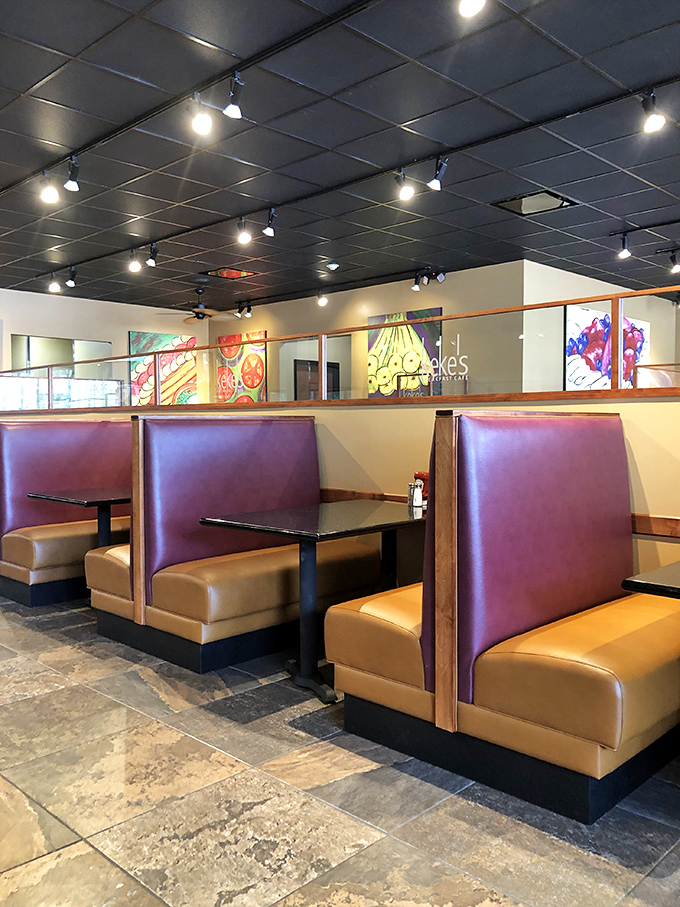 Booth seating that says "stay awhile" and artwork that celebrates food without being kitschy. The breakfast equivalent of smart casual.