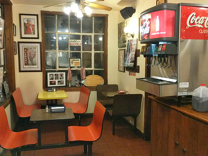 Where orange chairs and Alabama pride create the perfect backdrop for meat-induced happiness. No designer needed, just good taste.