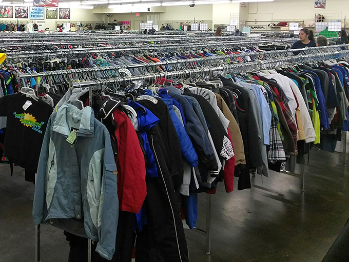 The jacket jungle: where winter wear hibernates during summer, waiting for that perfect match who appreciates both warmth and vintage style.