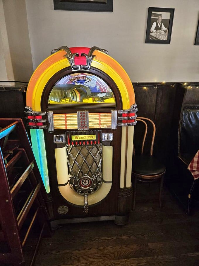 The vintage Wurlitzer jukebox stands as a musical time machine, ready to transport diners back to an era when songs cost a nickel and lasted forever.
