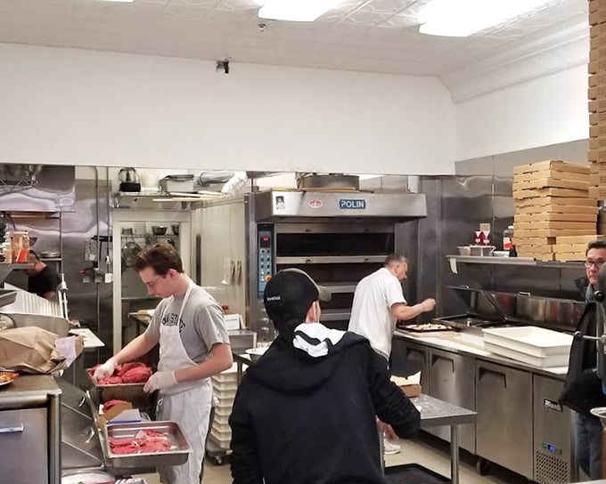 Where the magic happens &ndash; Angelo's kitchen crew works with the precision of surgeons and the passion of artists.