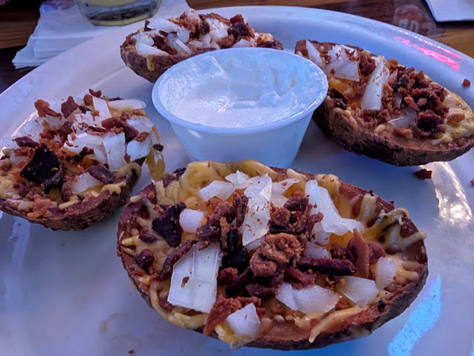 Loaded potato skins that remind you why some bar food classics never go out of style&mdash;a perfect harmony of crispy, gooey, and savory.