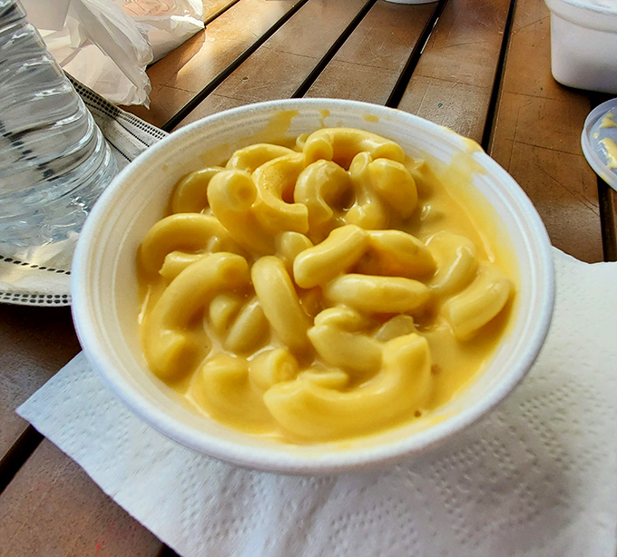 Mac and cheese that knows its role&mdash;simple, creamy, comforting, and ready to complement the smoky stars of the show.