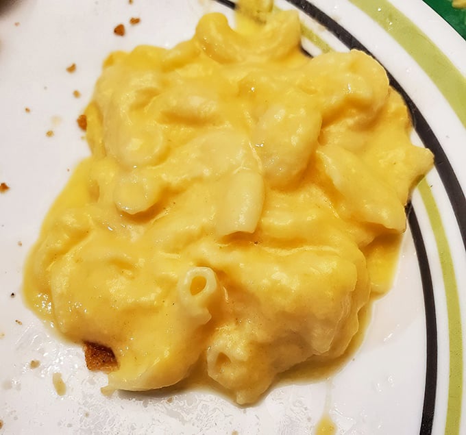 Mac and cheese so creamy and golden, it could make a grown person weep tears of pure joy.