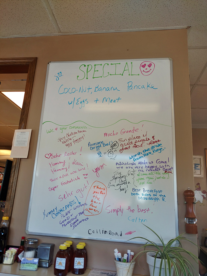 The specials board doubles as a guest book, with visitors leaving love notes to pancakes that have clearly changed lives across multiple languages.