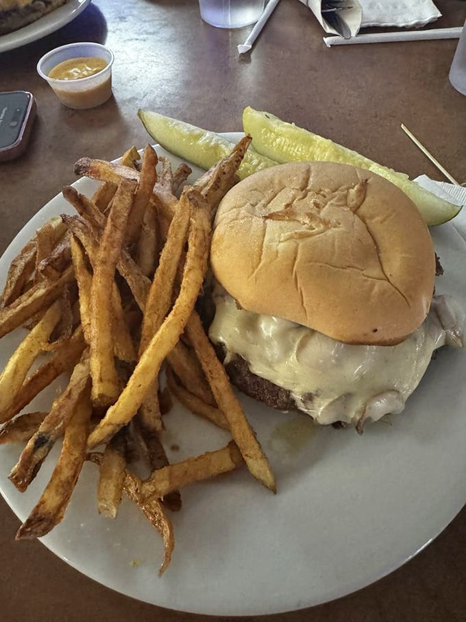 A mushroom Swiss burger so generous with toppings, you'll need a game plan just to pick it up.