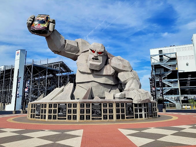 Bathed in perfect racing weather, Miles shows off his impressive physique&mdash;chiseled from concrete rather than hours at the gym.