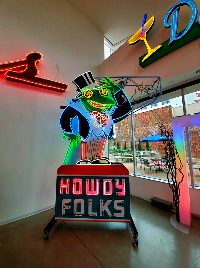 "Howdy Folks!" announces this dapper neon frog, dressed better than most of us on a Friday night.