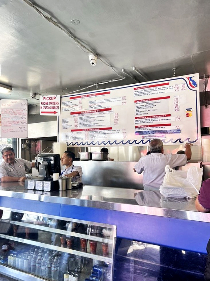 The ordering counter&mdash;command central for seafood operations. Where decisions are made, appetites are anticipated, and seafood journeys begin with a simple point and nod.