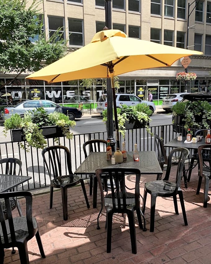 Yellow umbrellas create sunny oases along the sidewalk, where diners fuel up before exploring the city that Carl Sandburg called "stormy, husky, brawling."