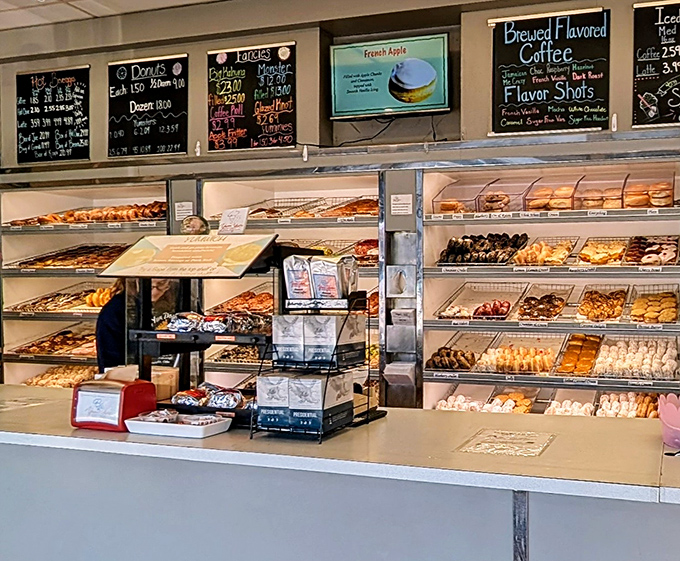 A display case that belongs in the Louvre&mdash;rows of donuts arranged with the precision of a Swiss watchmaker and the soul of an artist.