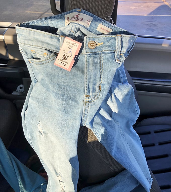 Hollister jeans with the tags still attached—the thrift store equivalent of finding an oasis in the desert.