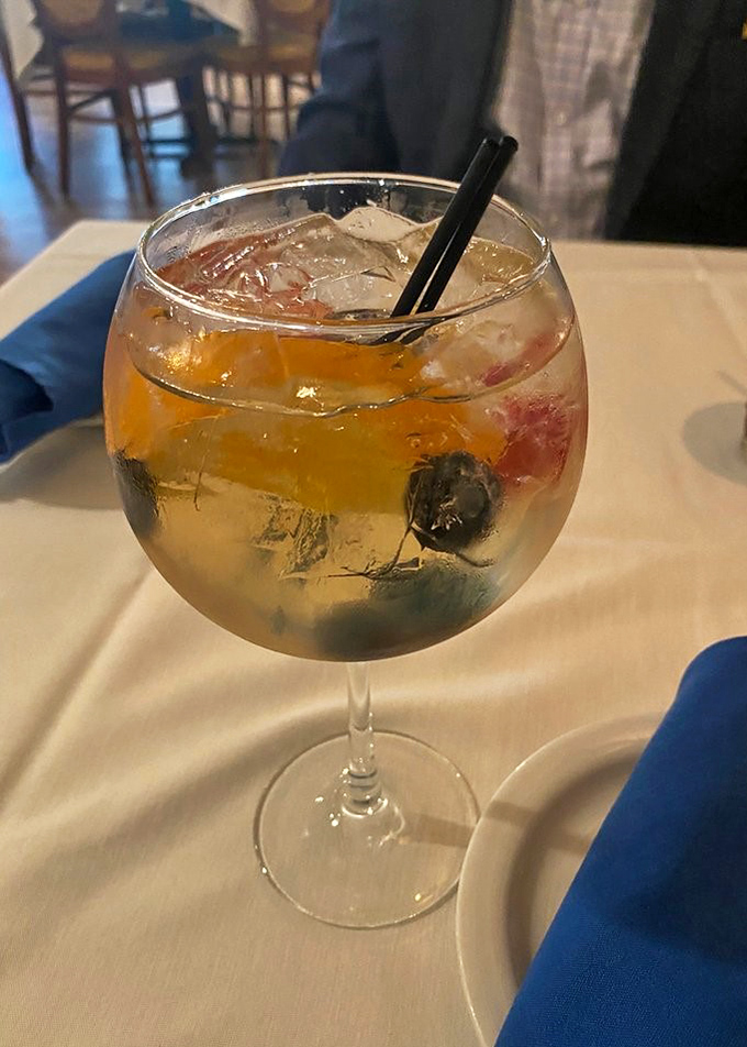 Peach sangria with fresh fruit that makes every sip feel like a mini vacation in a wine glass.