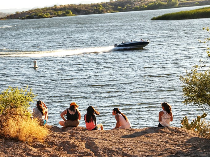 The original social media: actual socializing with a view. These lakeside loungers have discovered the perfect vantage point for boat-watching and sunset-catching.