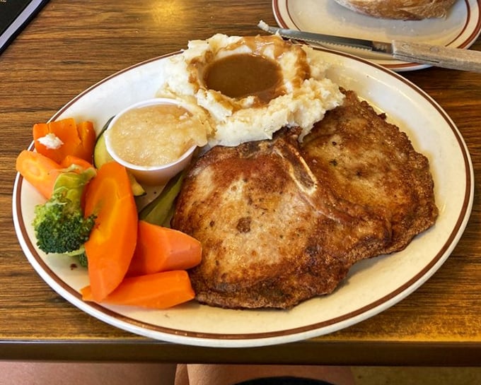 These pork chops aren't just breakfast&mdash;they're a commitment to excellence, served with vegetables that didn't come from a freezer bag. Grandma would approve.