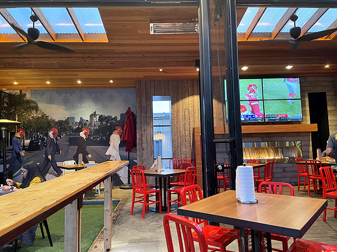 The dining area features whimsical chicken-themed art that somehow manages to be both hip and homey&mdash;like your coolest friend's apartment.