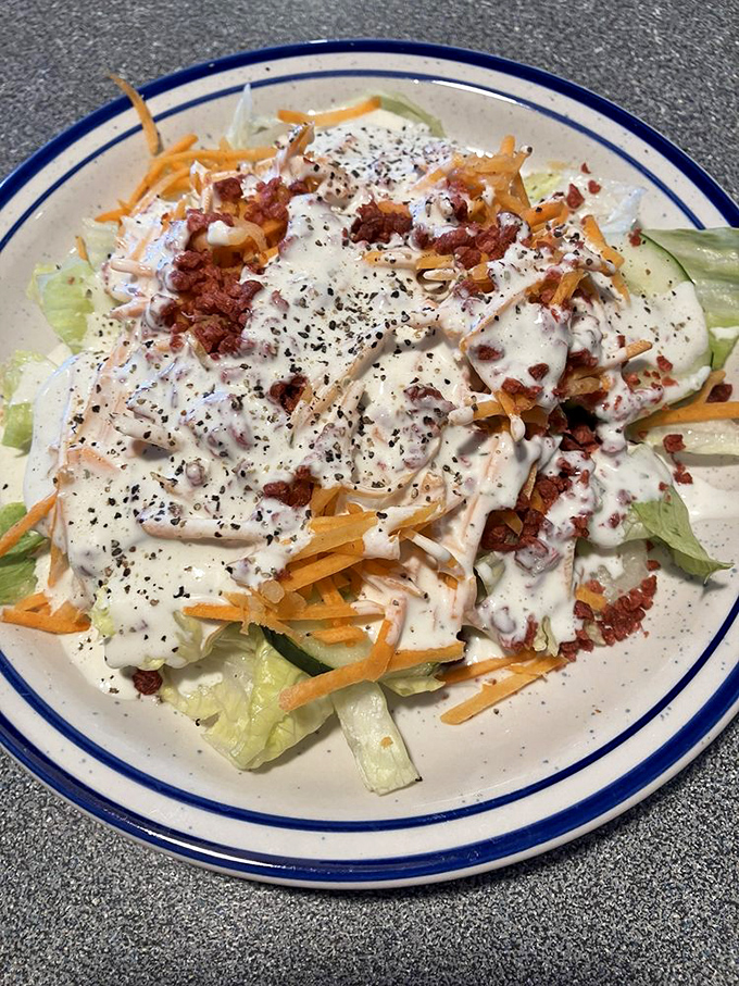 A salad that makes you feel virtuous for approximately three seconds before you realize it's mostly ranch dressing and bacon bits. Deliciously deceptive.