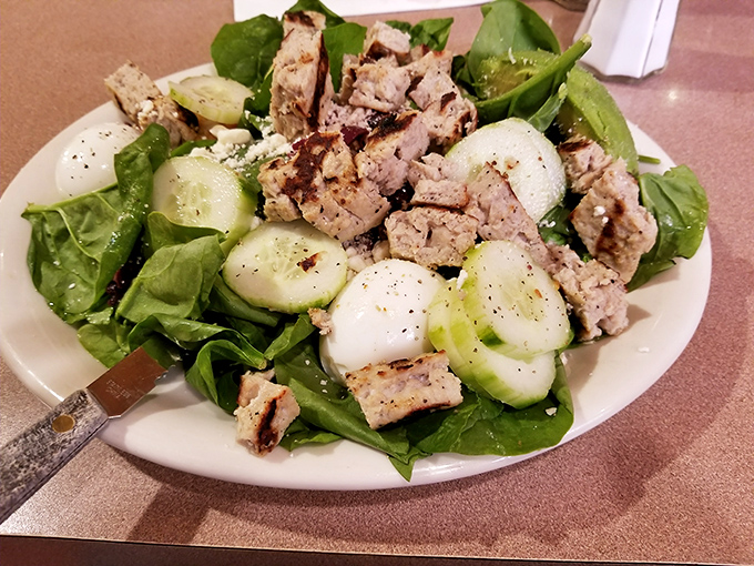 A salad that doesn't apologize for being healthy&mdash;it's too busy showing off its fresh ingredients and grilled chicken to care about your guilt.