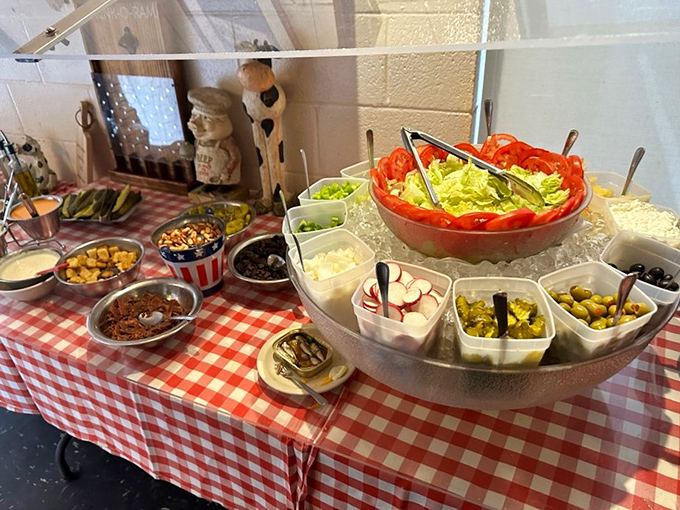 The salad bar&mdash;a humble spread of fresh ingredients waiting to become the prelude to your carnivorous symphony.