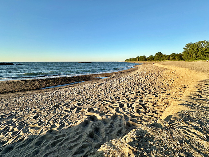 Mother Nature's finest sandbox stretches toward the horizon, where golden hour light transforms ordinary sand into treasure.
