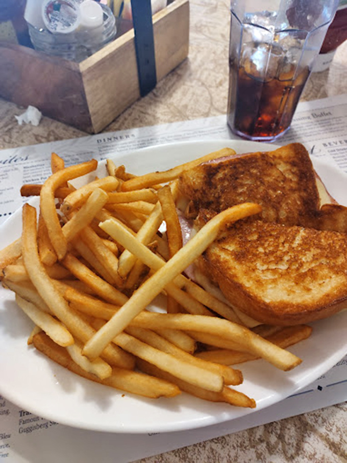 The humble grilled cheese and fries&mdash;elevated to art form status with bread toasted to that precise golden-brown perfection.