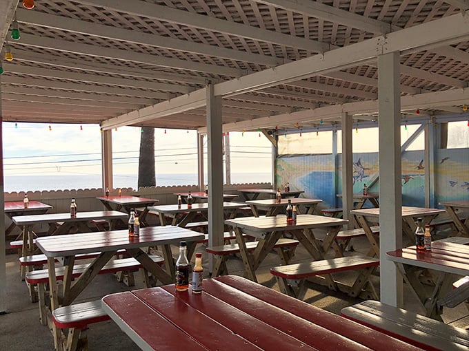 The covered patio feels like your cool neighbor's backyard, if your neighbor had million-dollar ocean views.