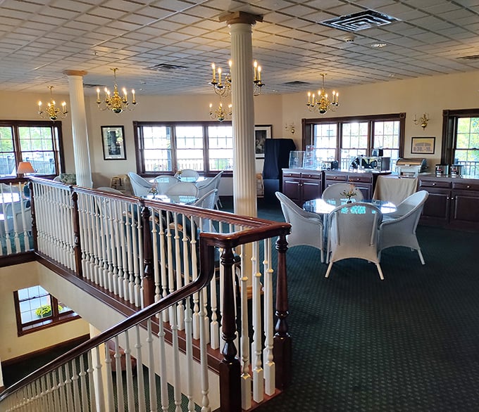 The second-floor dining area combines elegance with country charm &ndash; chandeliers and white wicker create an atmosphere where lingering over coffee feels mandatory.