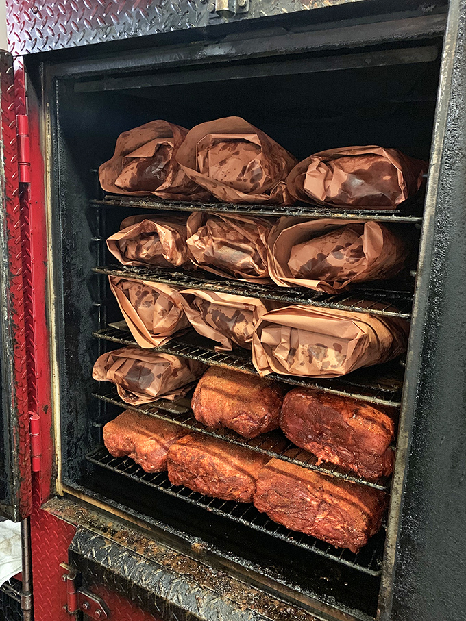 The smoker&mdash;where meat dreams come true. Those wrapped packages are like Christmas presents for your taste buds, just waiting to be unwrapped.